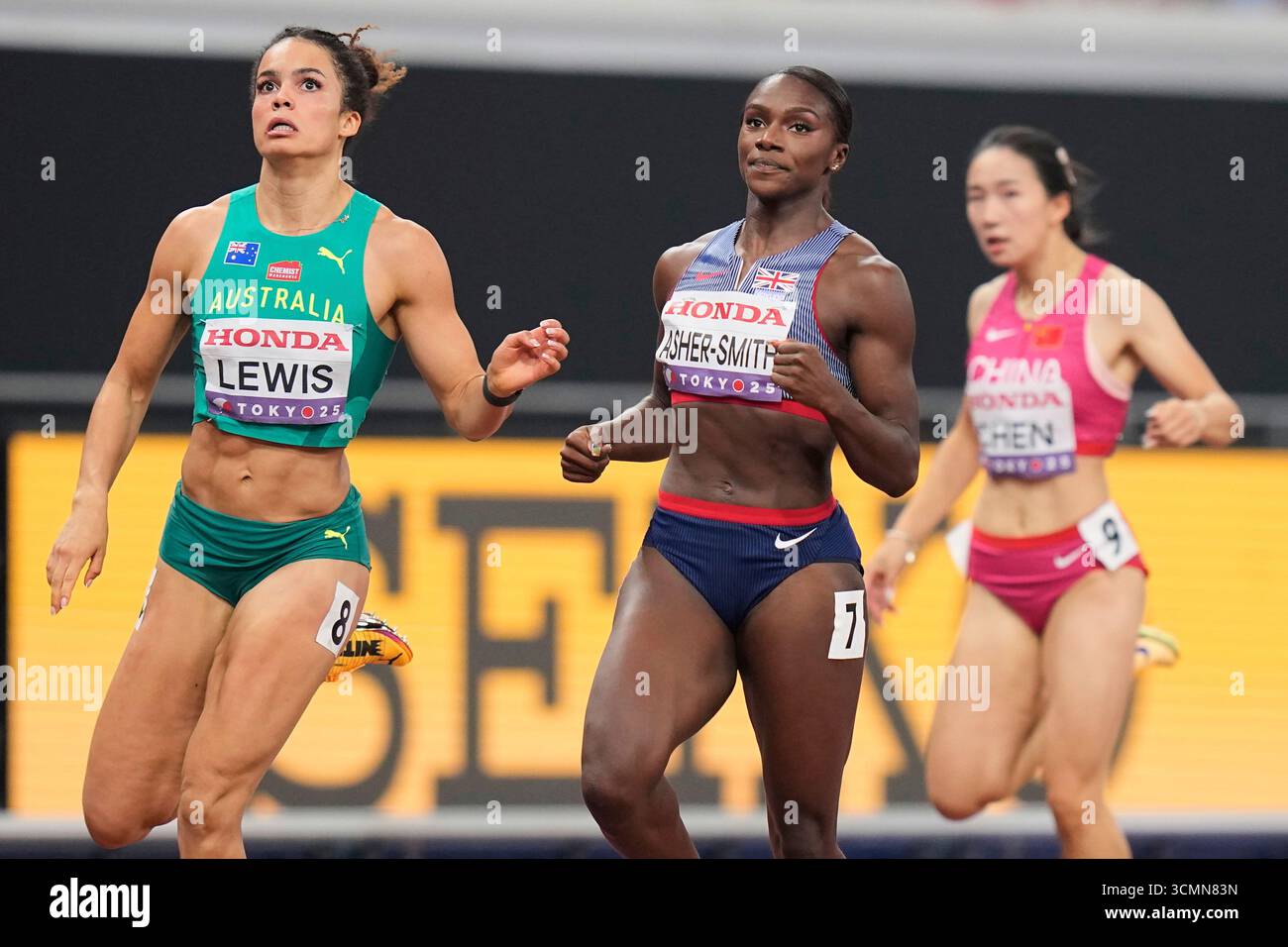 From left, Australia's Torrie Lewis, Britain's Dina Asher-Smith and China's Chen Yujie compete ...