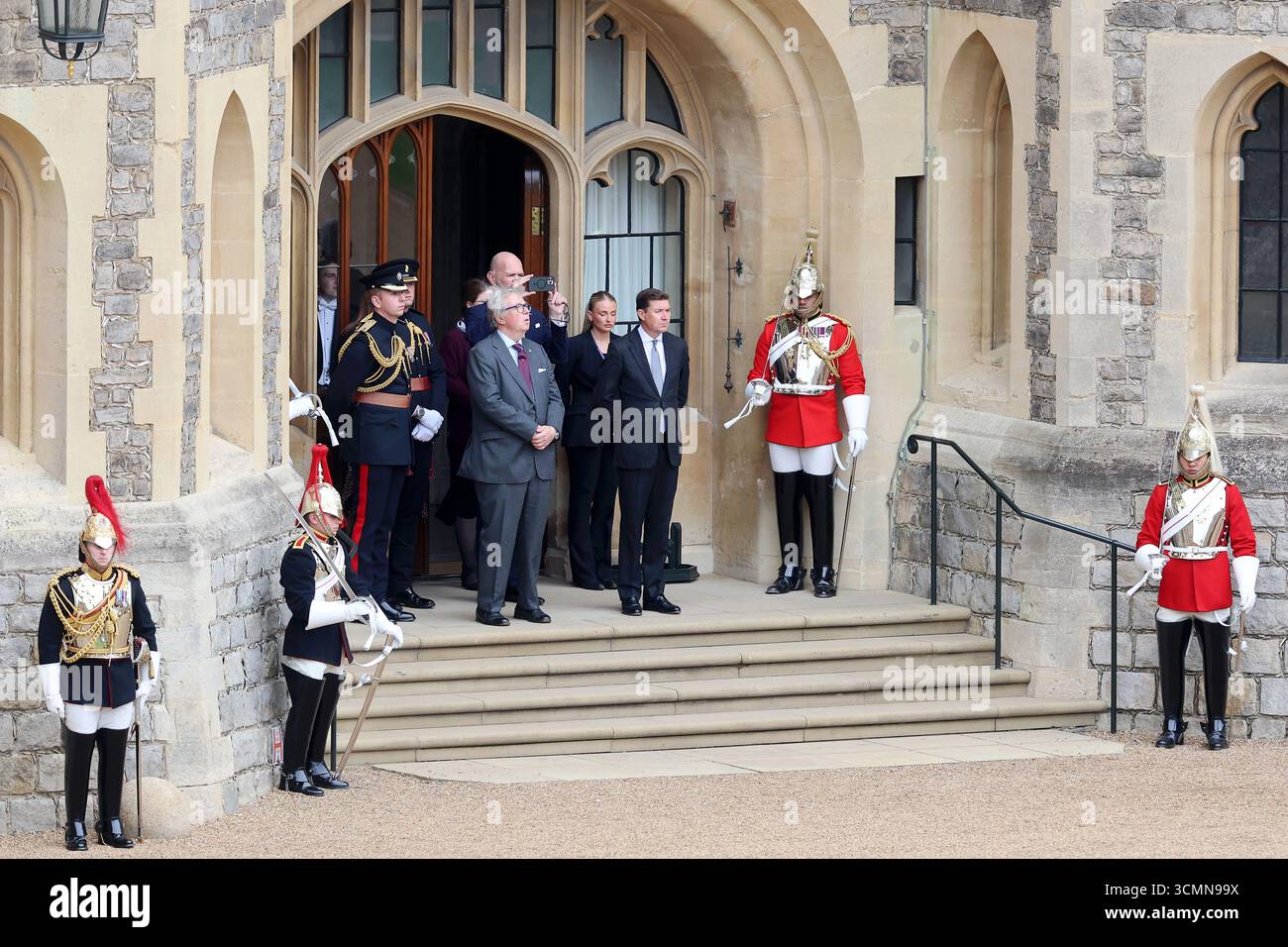 UK Ambassador to the US, James Roscoe (centre), ahead of the ceremonial ...
