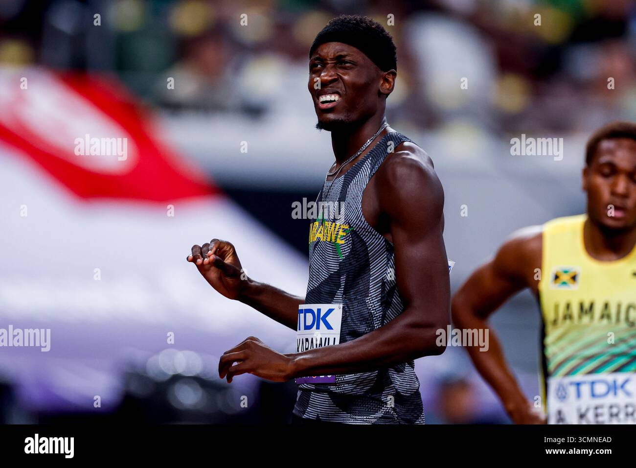 Tapiwanashe Makarawu of Zimbabwe celebrates after competing in the Men ...