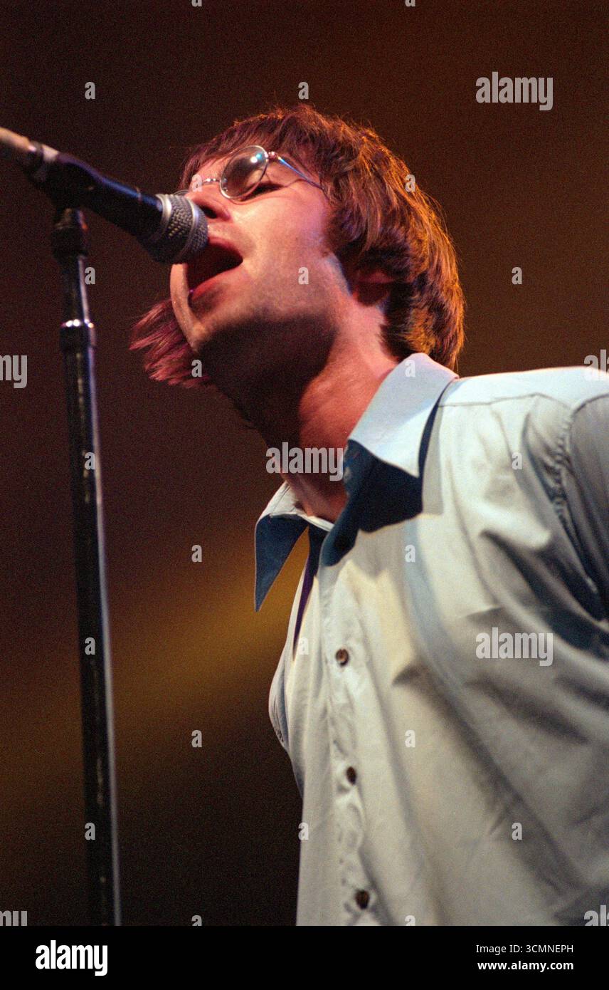 Singer Liam Gallagher on stage at the microphone during the Oasis ...