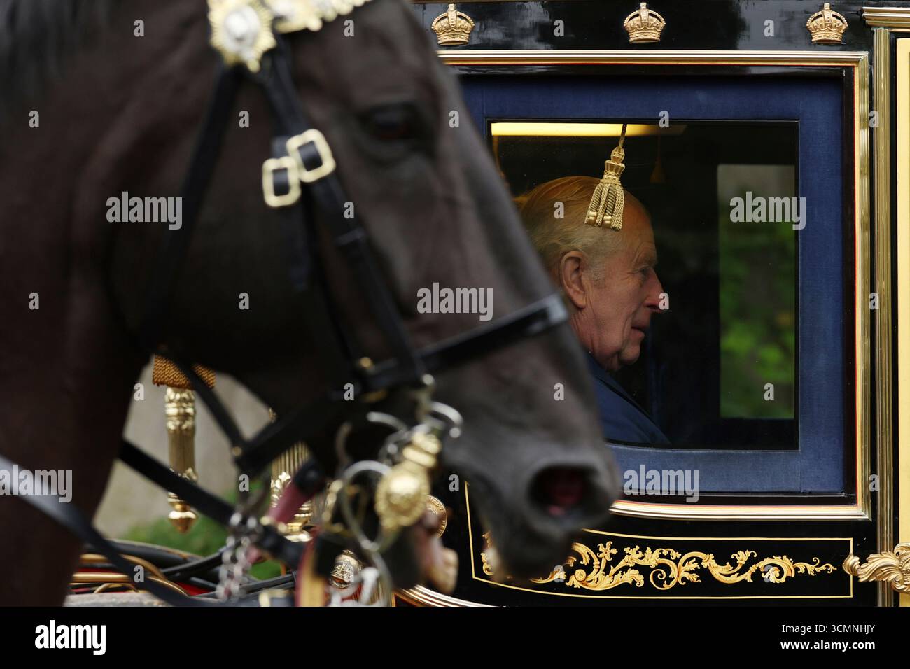 Britain's King Charles III and President Donald Trump, unseen, travel in The Irish State Coach ...