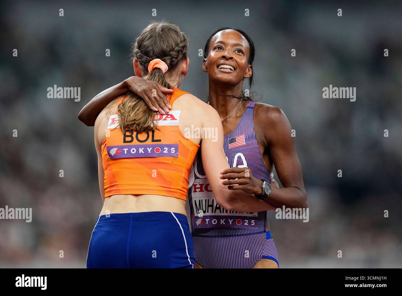 Netherlands' Femke Bol embraces United States' Dalilah Muhammad after ...