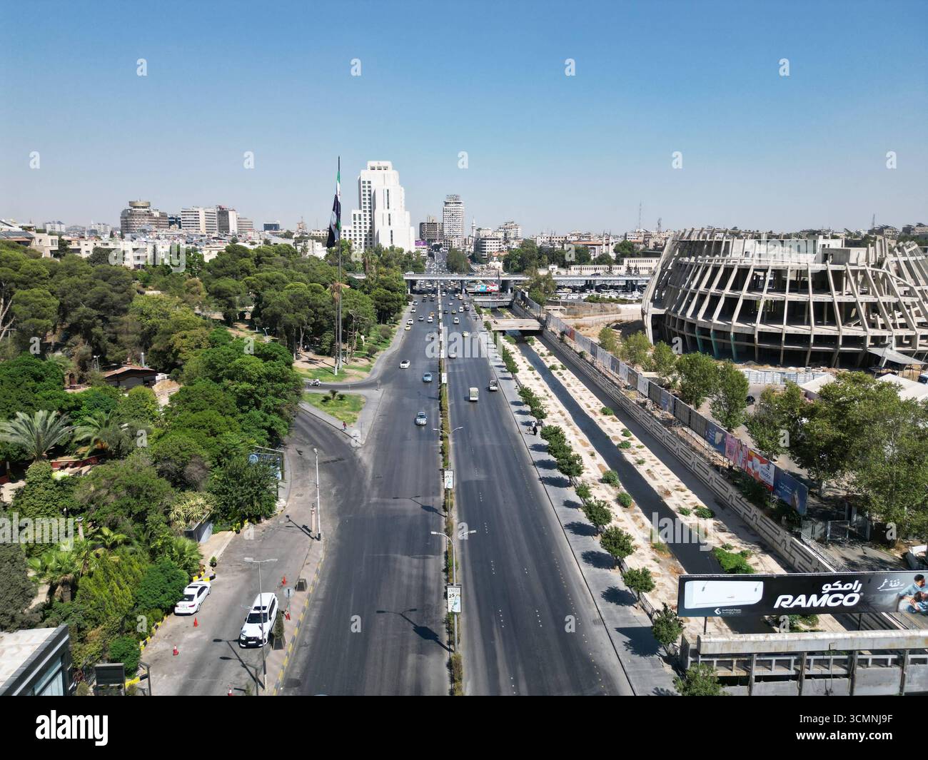 Aerial views of Damascus with national flag Aerial view shows the new ...