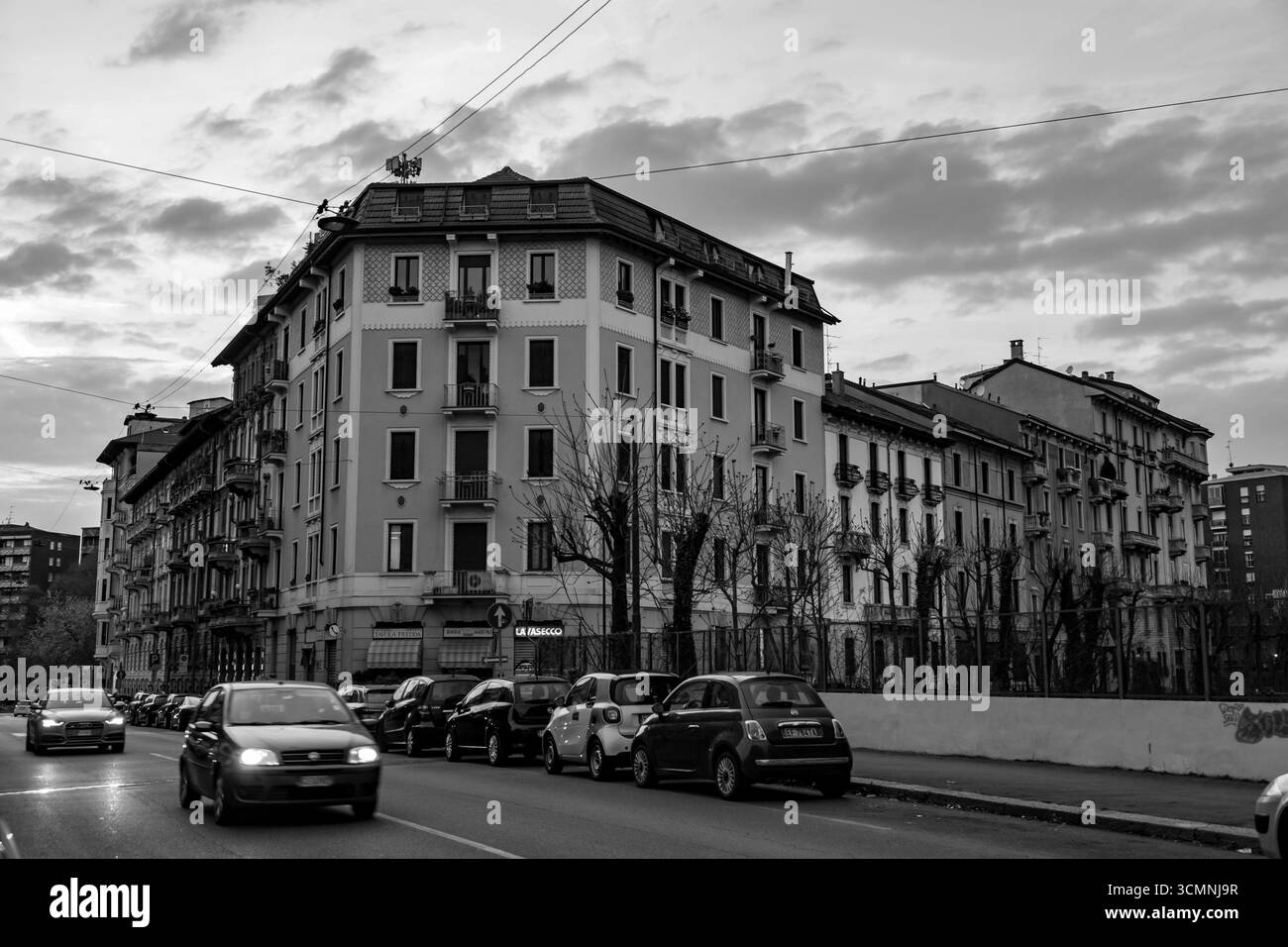 Milan, Italy - March 31: Typical Italian buildings and street view in ...