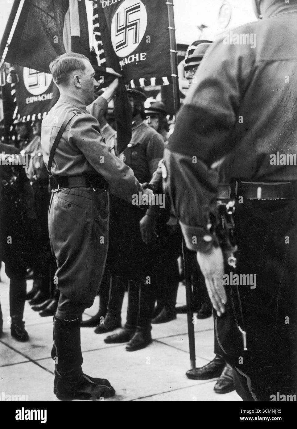 Reich Chancellor Adolf Hitler with Swastika banner during the roll call ...