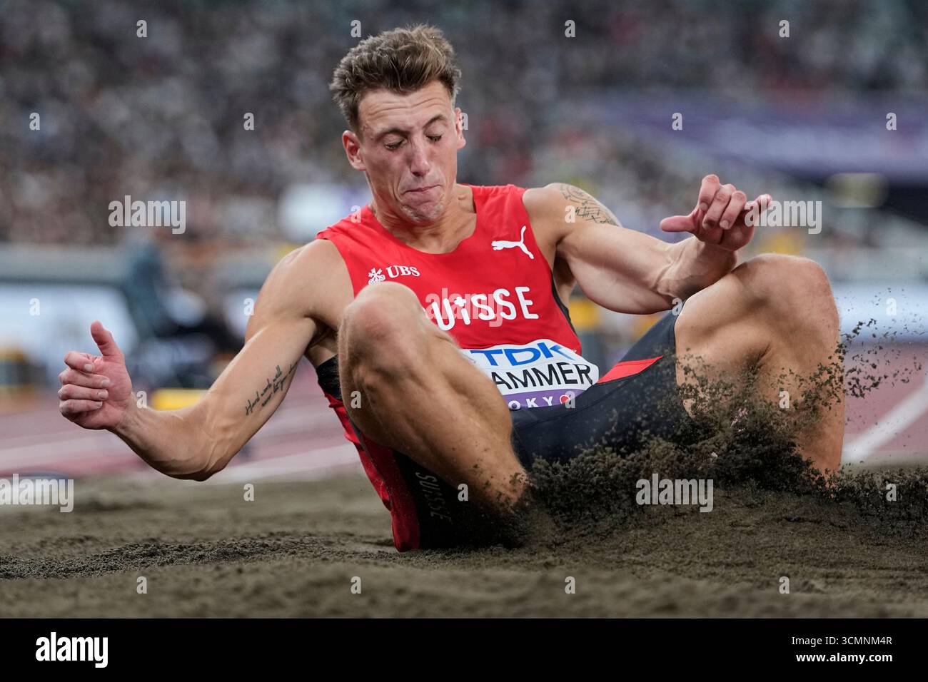 Switzerland's Simon Ehammer competes in the men's long jump final at ...