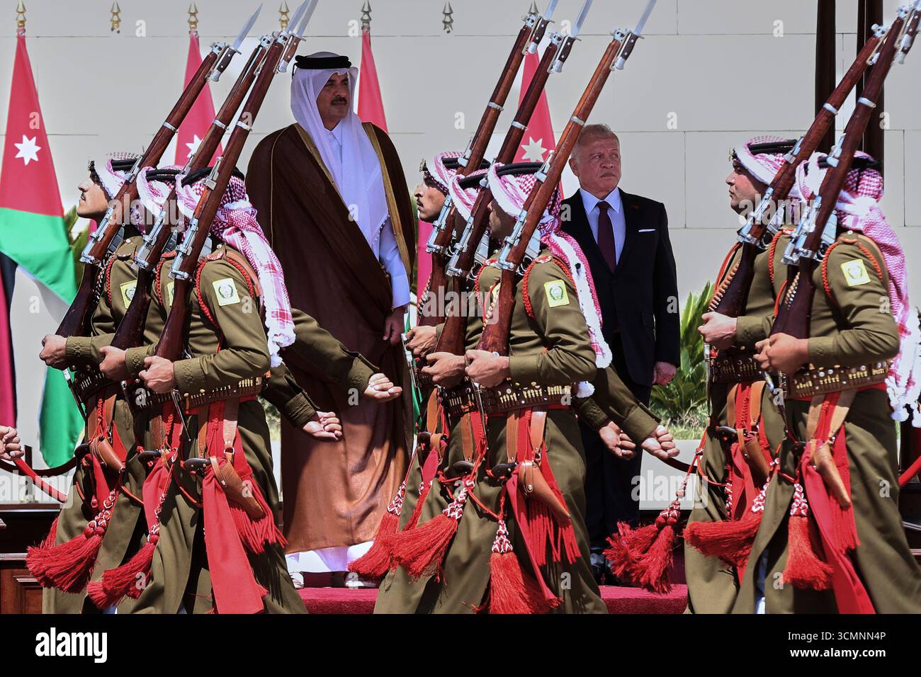 Jordan's King Abdullah II, right, and Qatar's Emir Tamim bin Hamad Al ...