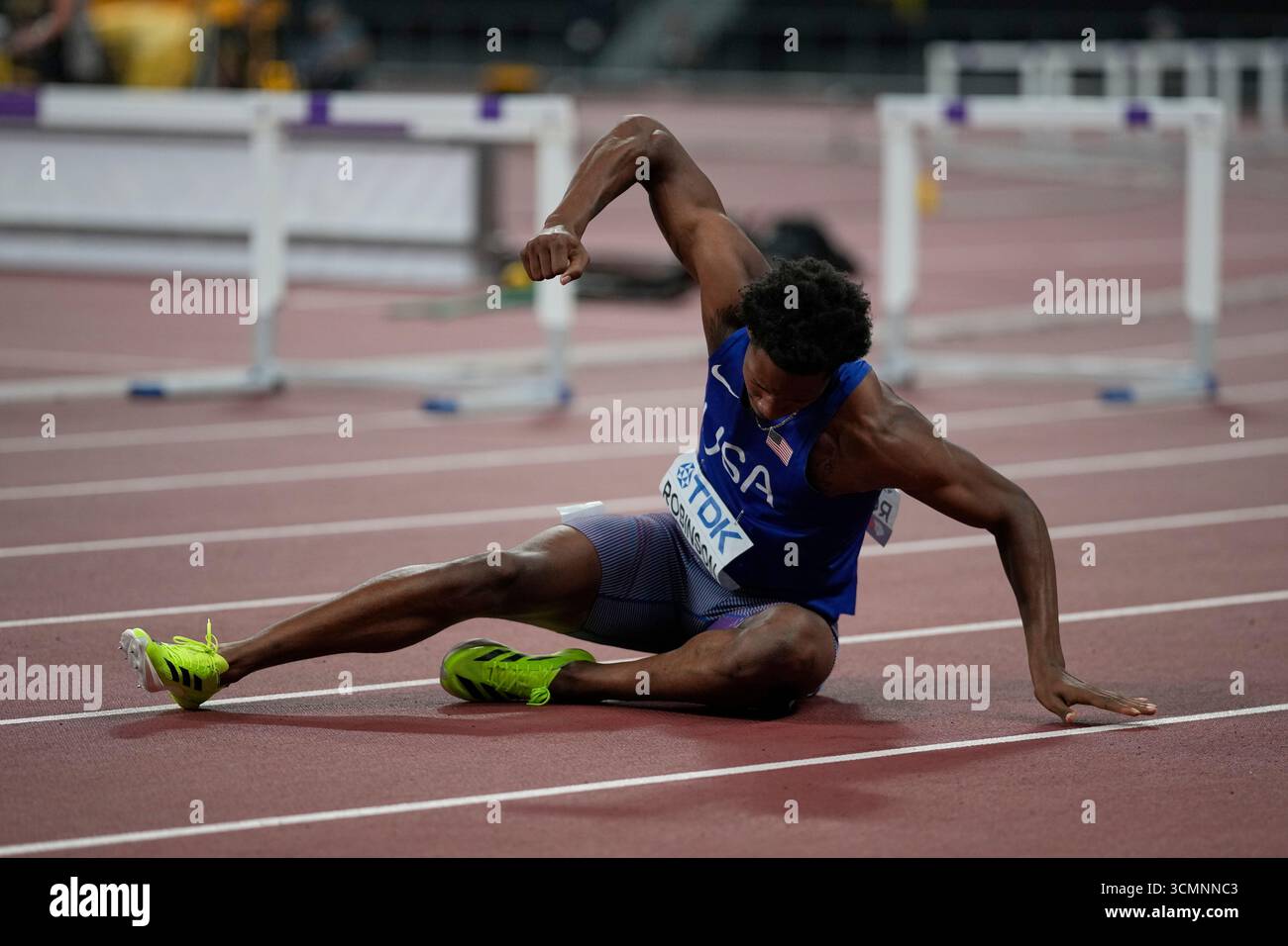 United States' Chris Robinson reacts after an injury in the men's 400 ...