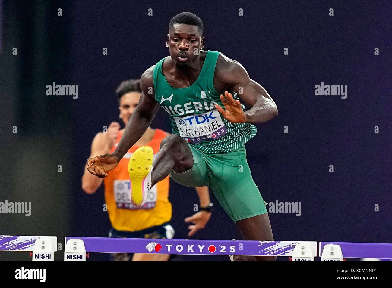 Nigeria's Ezekiel Nathaniel races in a men's 400 meters hurdles ...