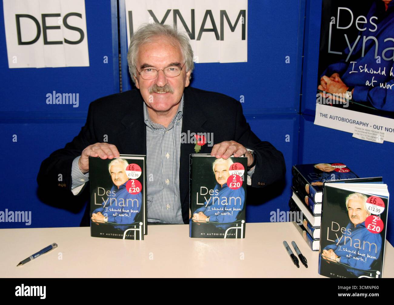 Des Lynam signs copies of his autobiography "I Should Have Been At Work ...