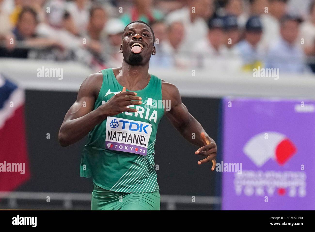Nigeria's Ezekiel Nathaniel reacts after competing in men's 400 meters ...