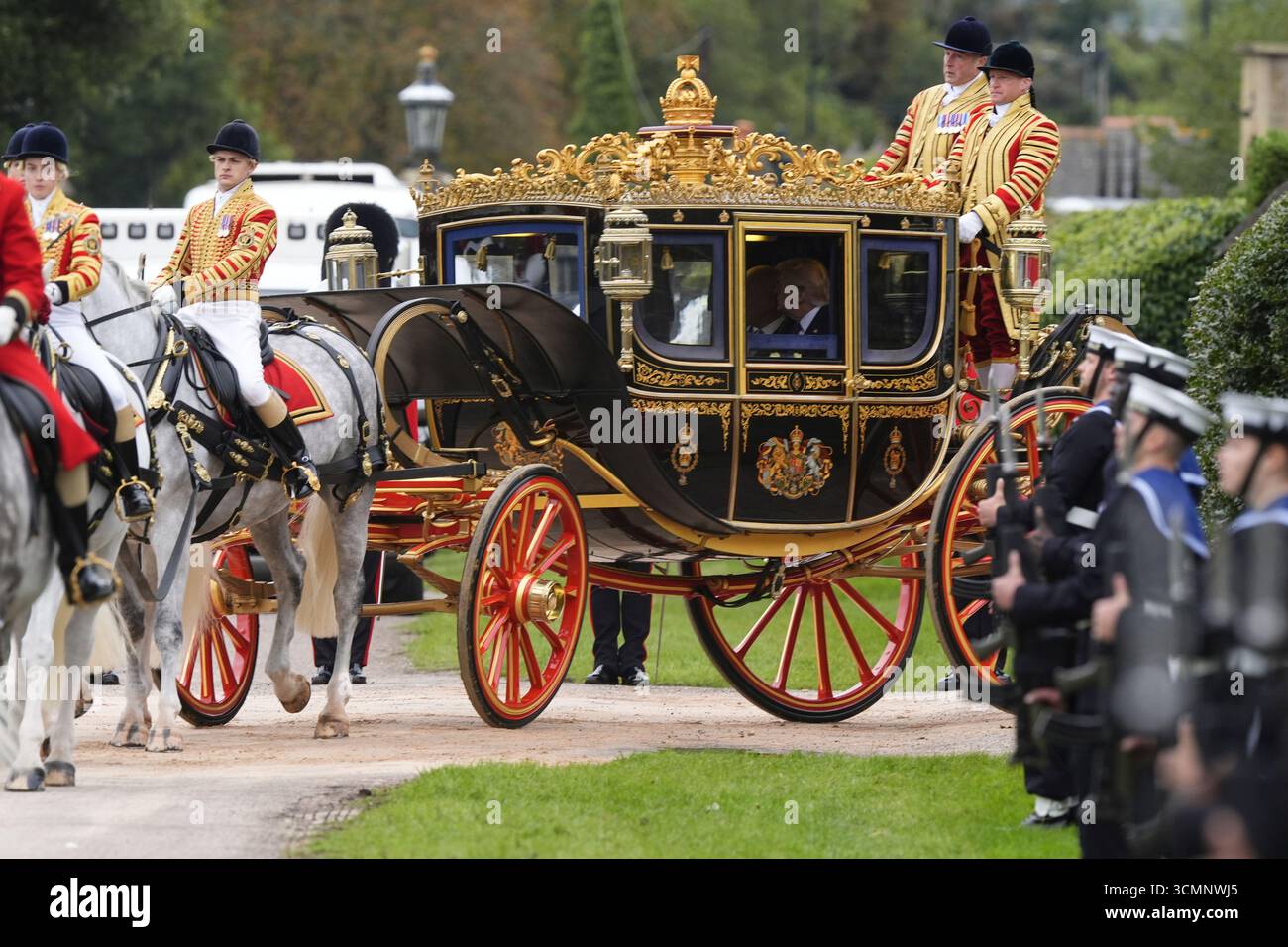 President Donald Trump and Britain's King Charles III are seen inside a ...