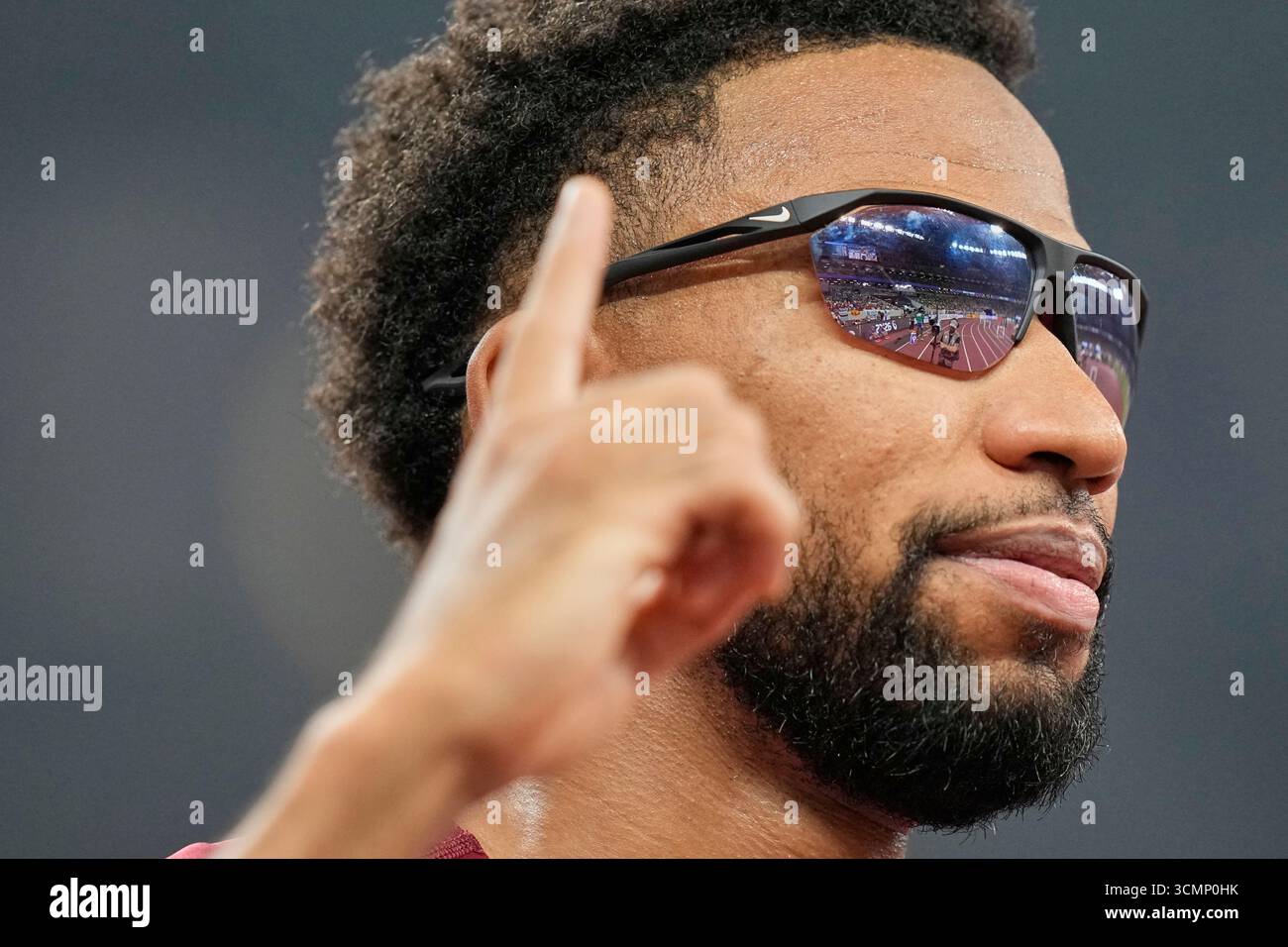 Qatar's Abderrahman Samba reacts after competing in men's 400 meters ...