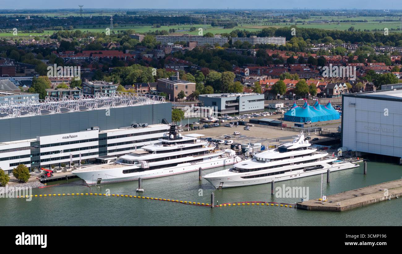 Aerial view of two Luxury superyachts moored at the Oceanco shipyard in ...