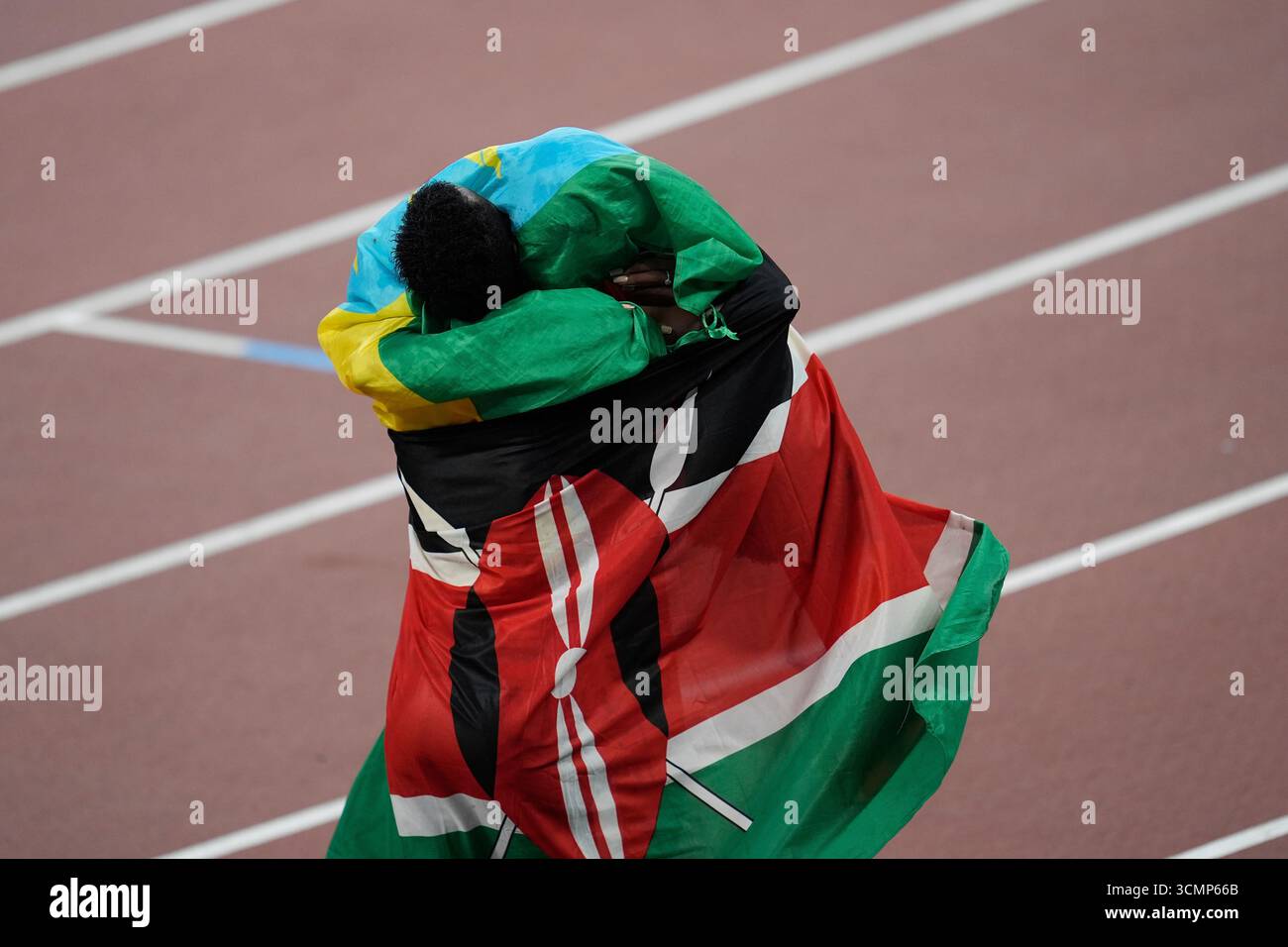 Kenya's Faith Cherotich and Ethiopia's Sembo Almayew celebrate after ...