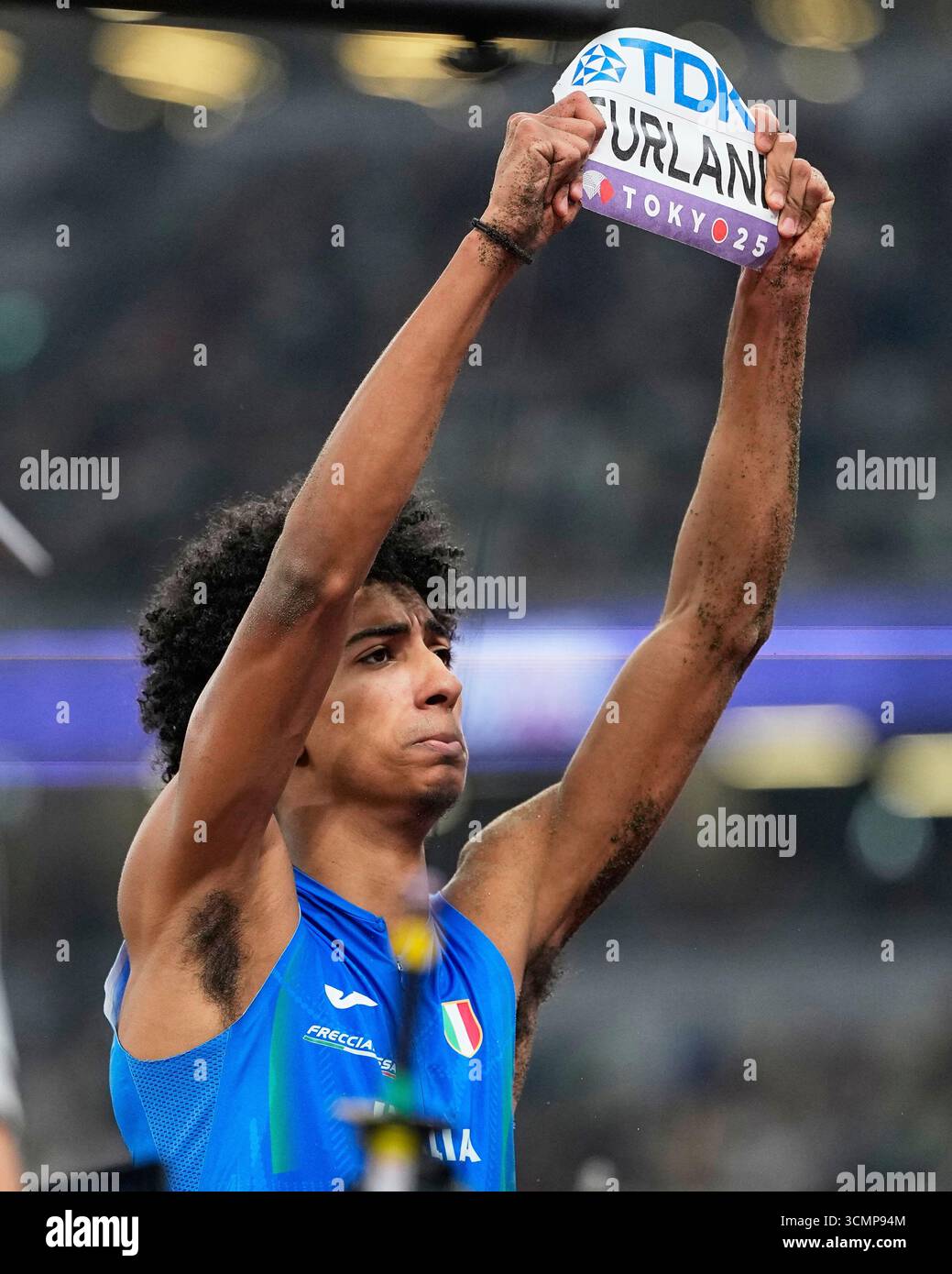 Italy's Mattia Furlani reacts after winning the men's long jump final ...