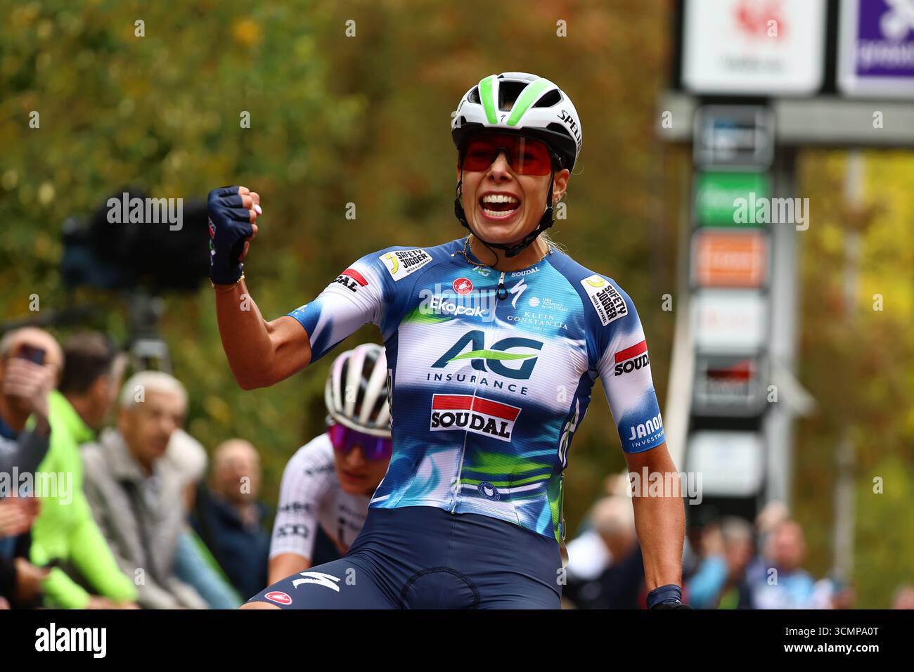 Belgian Shari Bossuyt celebrates as she crosses the finish line to win ...