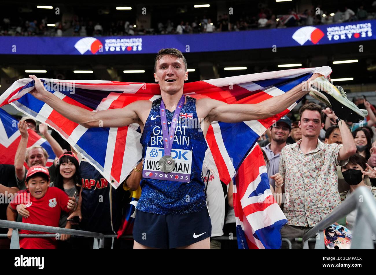 Jake Wightman of Great Britain with his silver medal following the Men ...