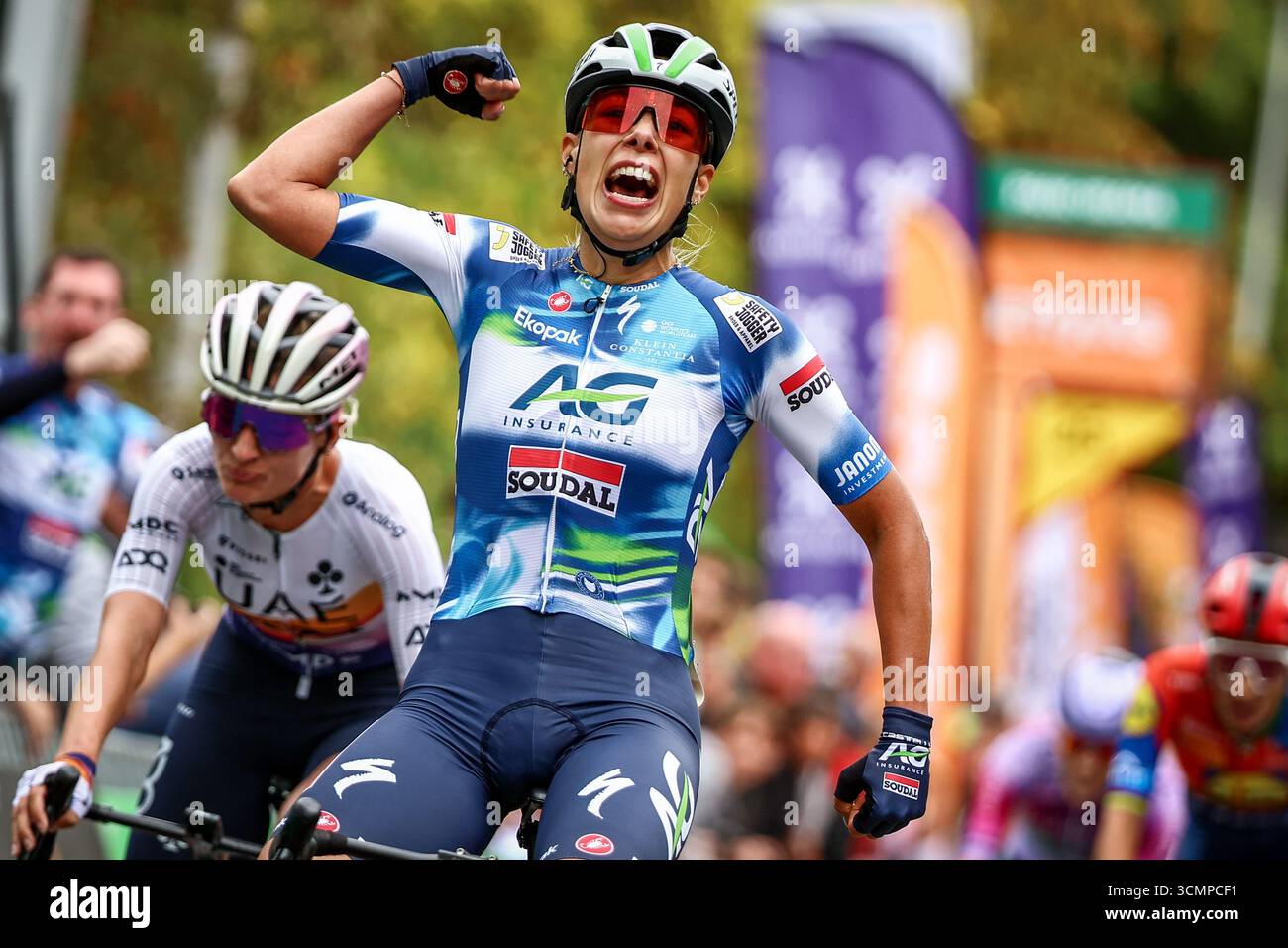 Belgian Shari Bossuyt celebrates as she crosses the finish line to win ...