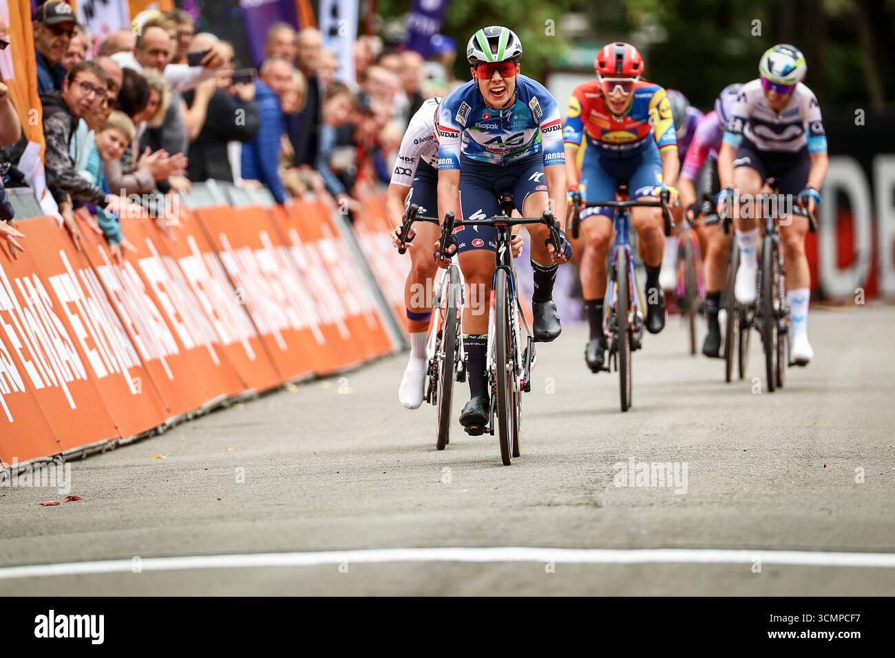 Belgian Shari Bossuyt celebrates as she crosses the finish line to win ...