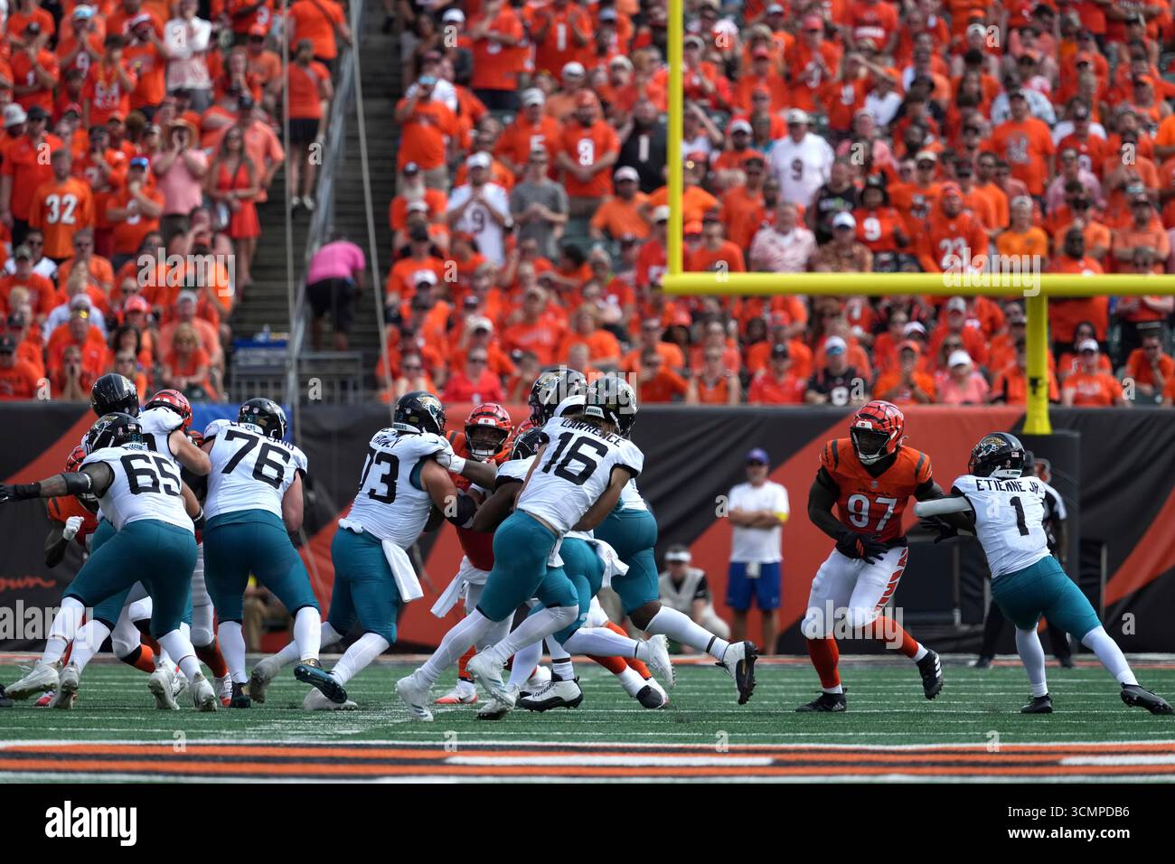Jacksonville Jaguars quarterback Trevor Lawrence hands the ball off to ...