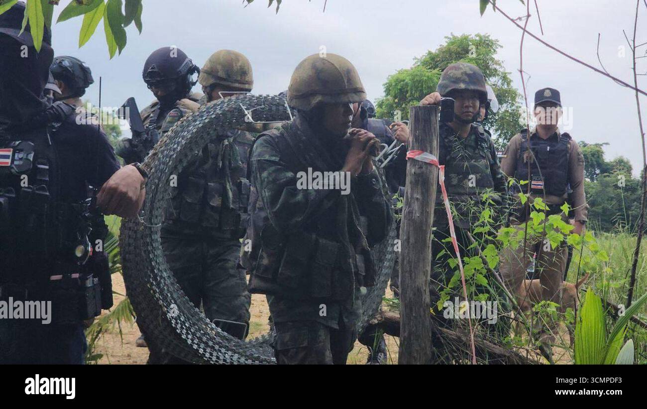 In this photo released by Agence Kampuchea Press (AKP), Thai soldiers ...