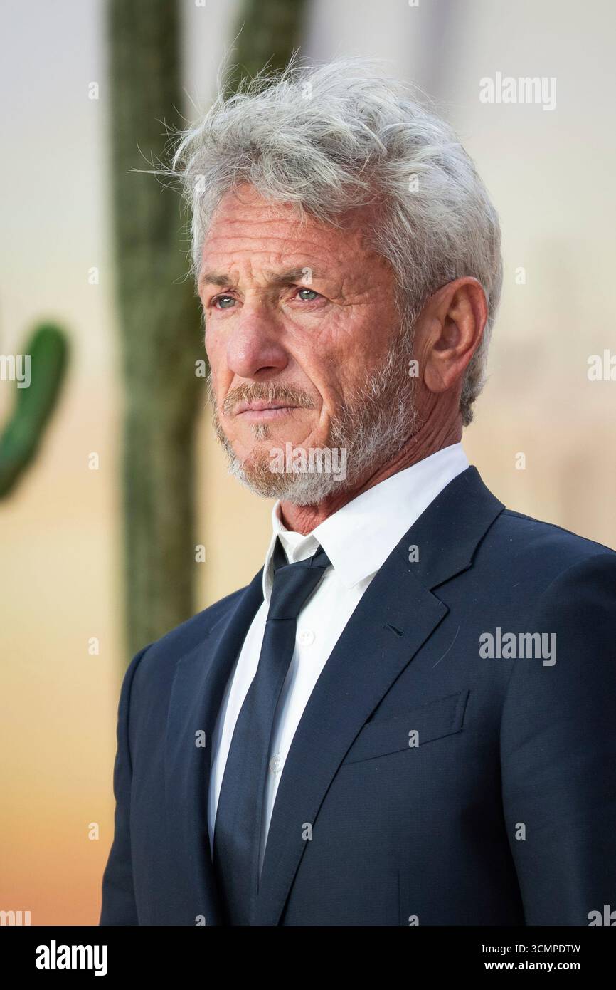 Sean Penn poses for photographers upon arrival at the premiere of the ...