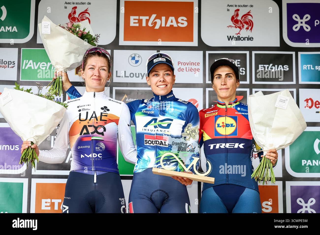 Dutch Karlijn Swinkels of UAE Team ADQ, Belgian Shari Bossuyt and ...