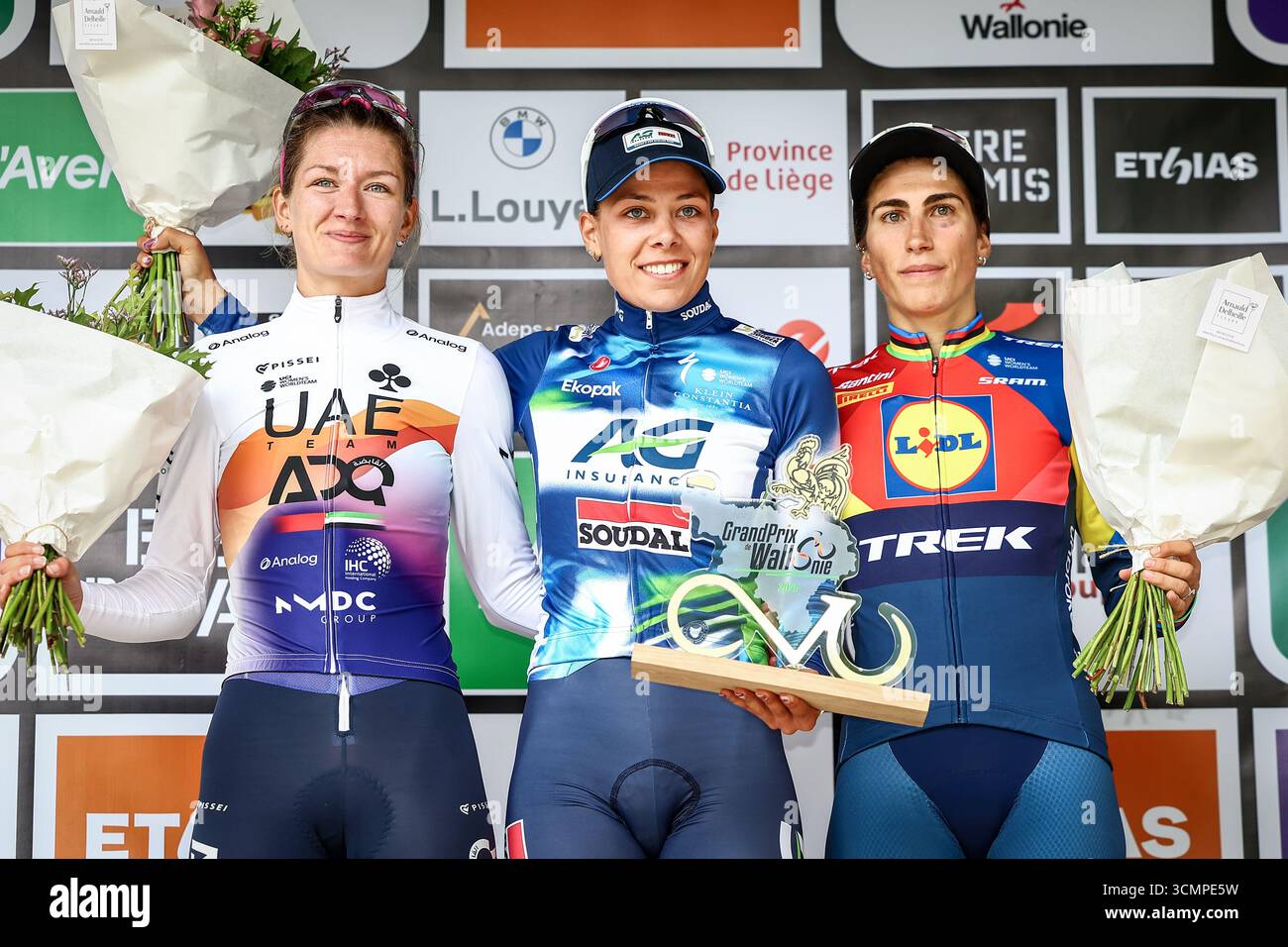 Dutch Karlijn Swinkels of UAE Team ADQ, Belgian Shari Bossuyt and ...