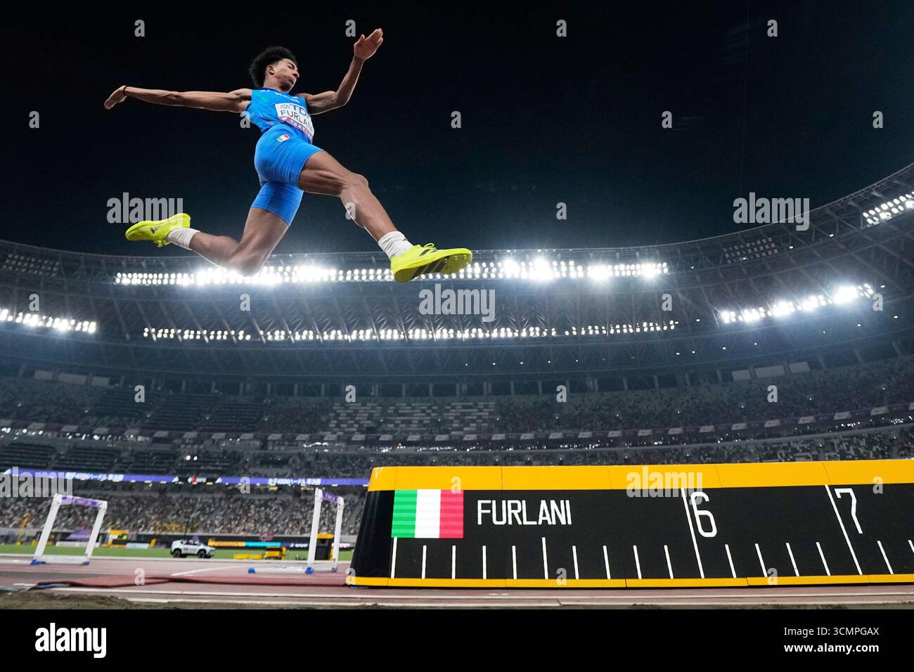 Italy's Mattia Furlani competes in the men's long jump final at the ...