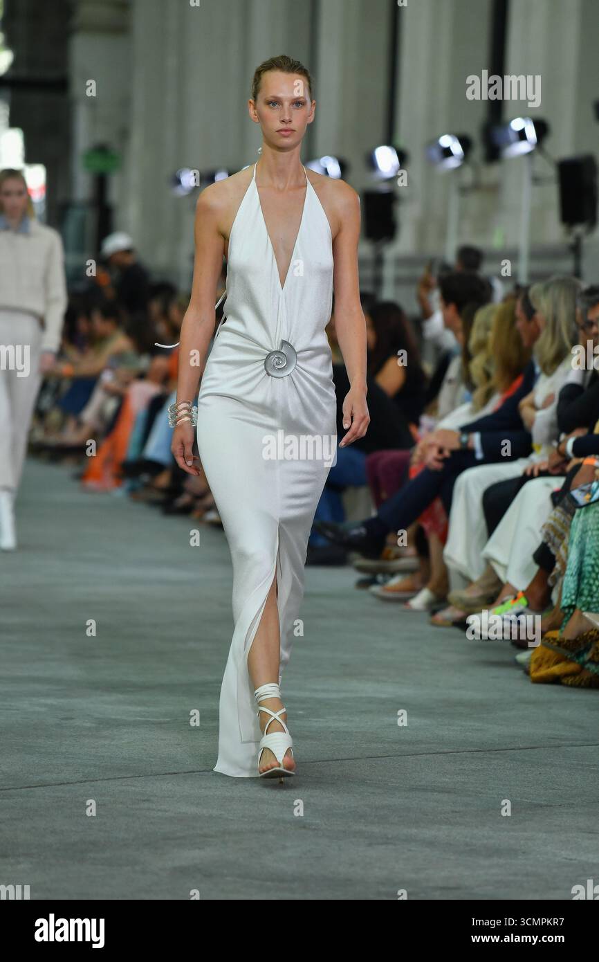 A model walks the runway wearing a design by Silvia Tcherassi during ...