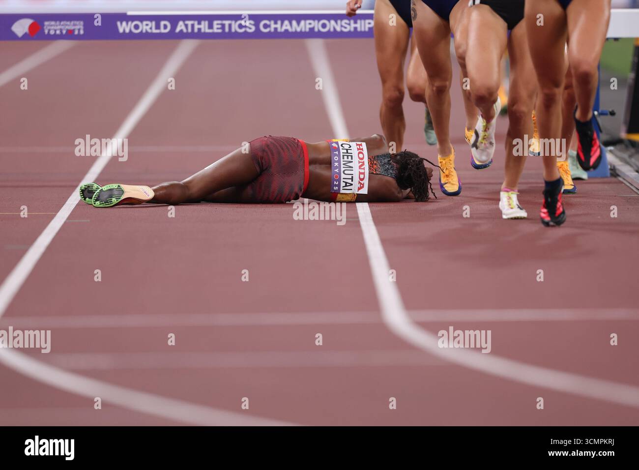 Peruth Chemutai (UGA) falls causing athletes to avoid her in the 3000m ...