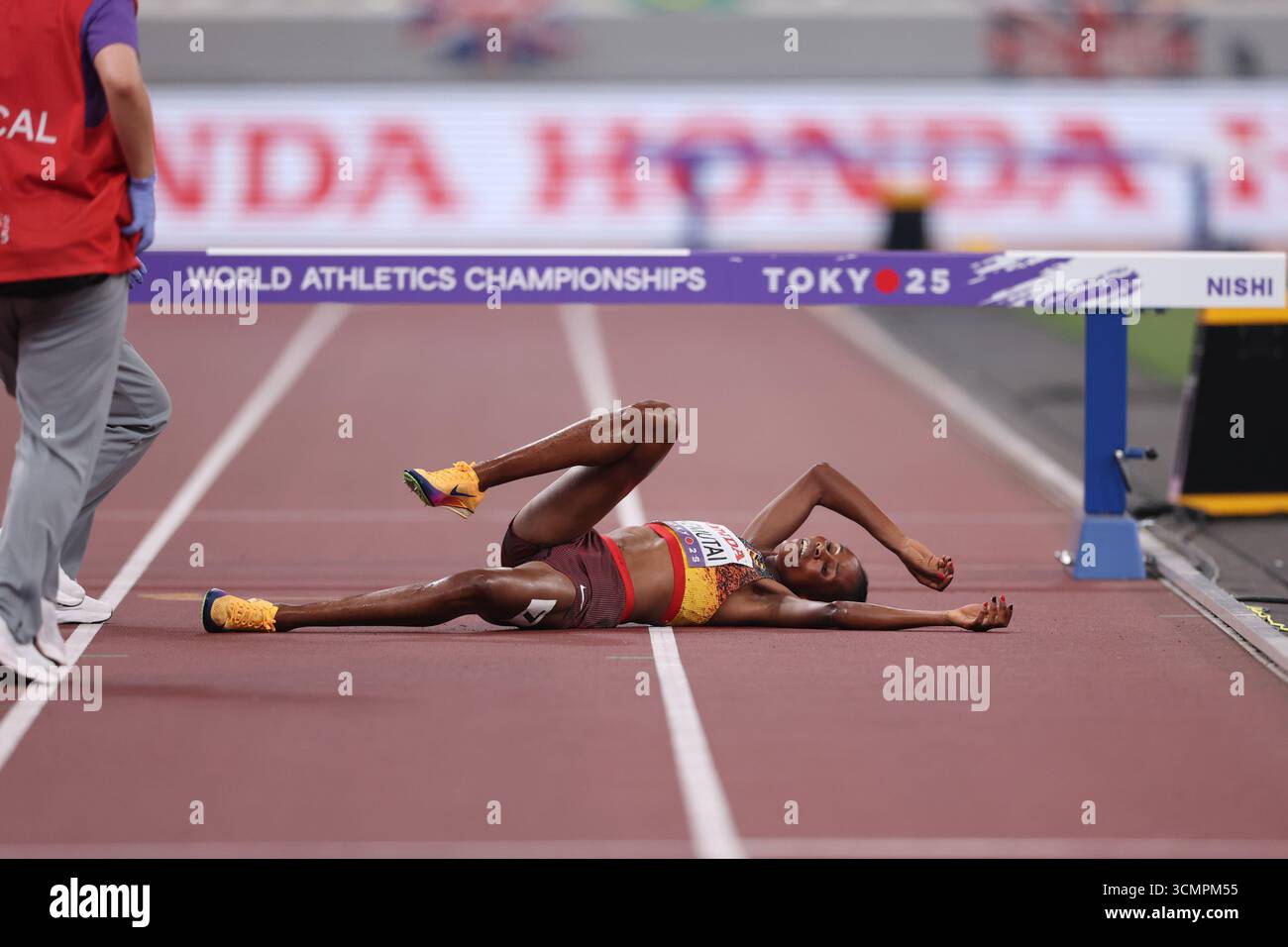 Peruth Chemutai (UGA) falls causing athletes to avoid her in the 3000m ...
