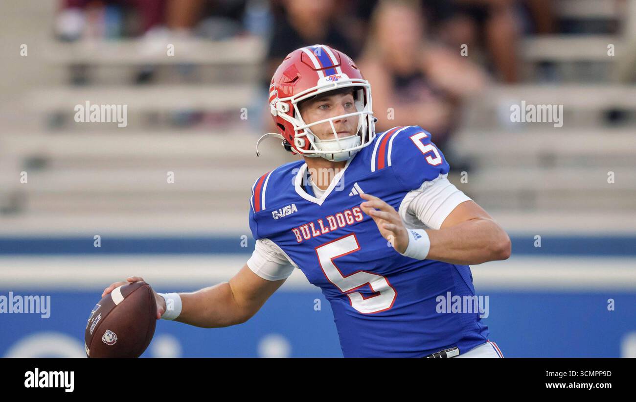 Louisiana Tech quarterback Blake Baker (5) throws during an NCAA ...