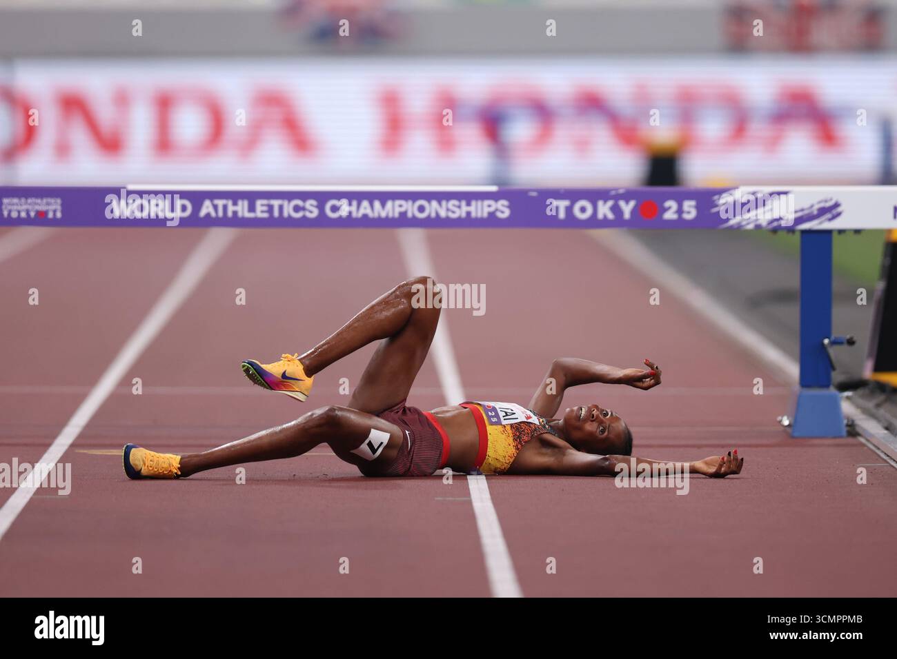 Peruth Chemutai (UGA) falls causing athletes to avoid her in the 3000m ...