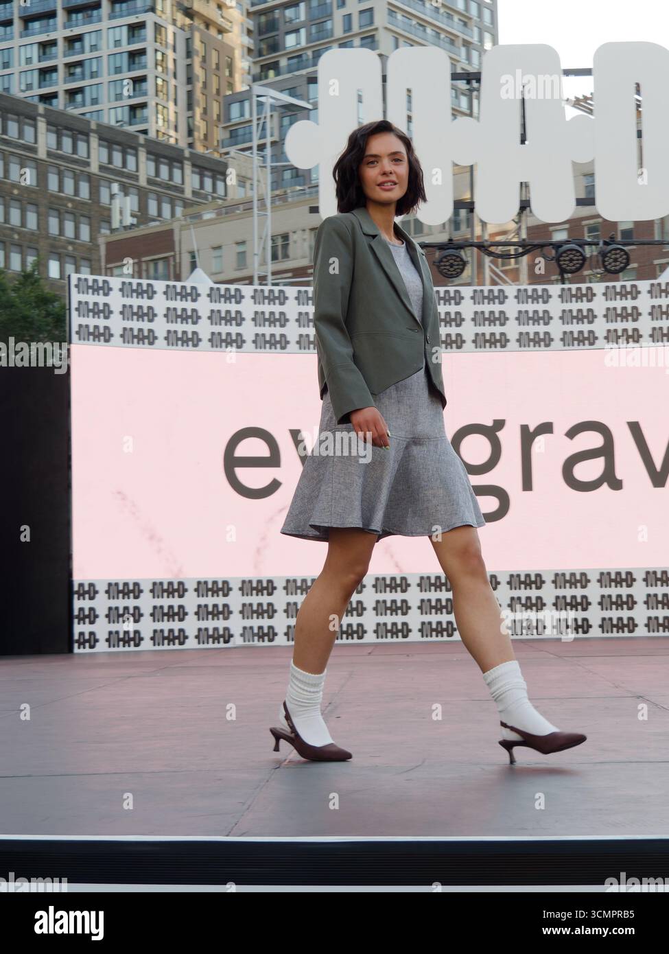 A model walks the runway at the Eve Gravel fashion show held during the ...