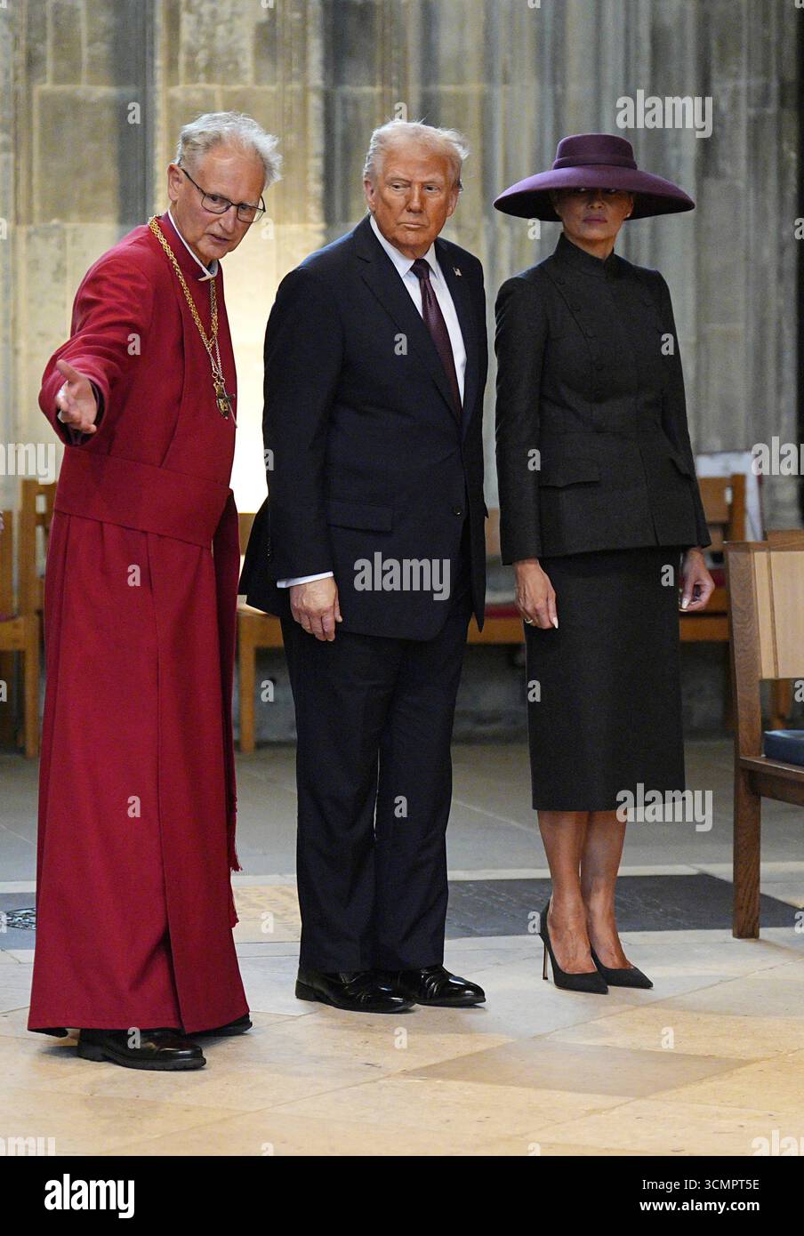 The Dean of Windsor, Rt. Rev. Christopher Cocksworth, left, gestures to ...