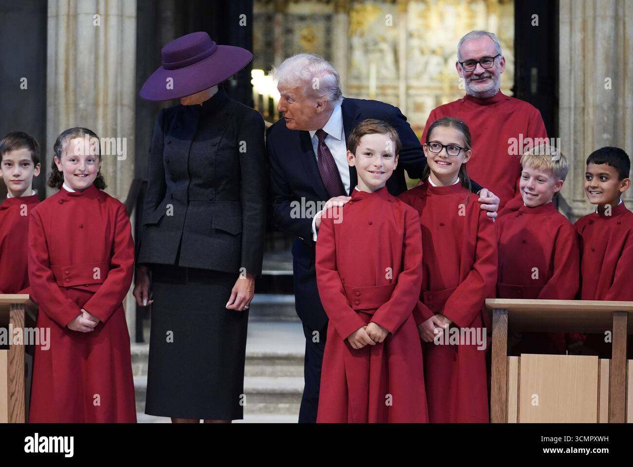 President Donald Trump and first lady Melania Trump pose with a ...