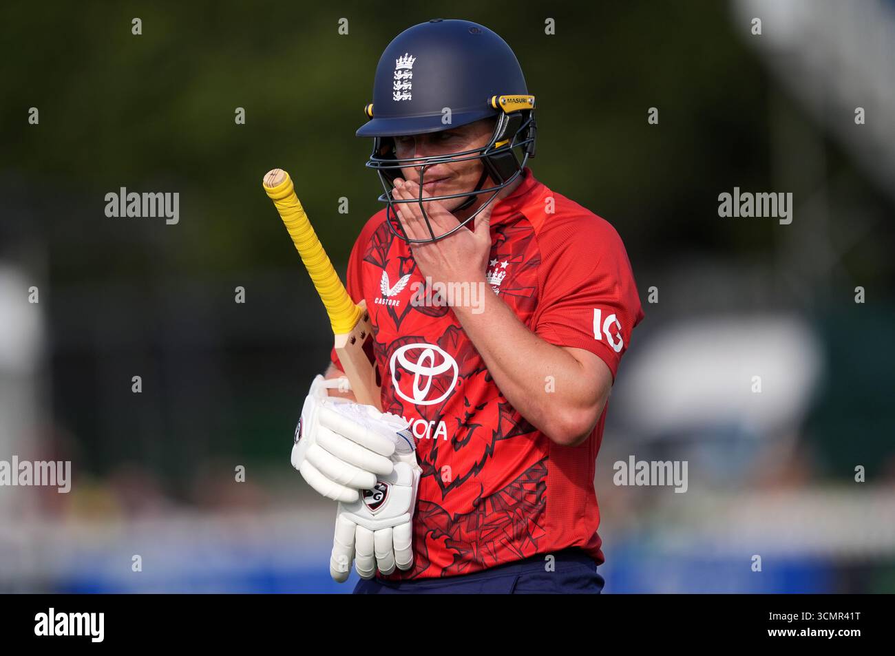 England's Sam Curran walks after being caught out by Ireland's George ...