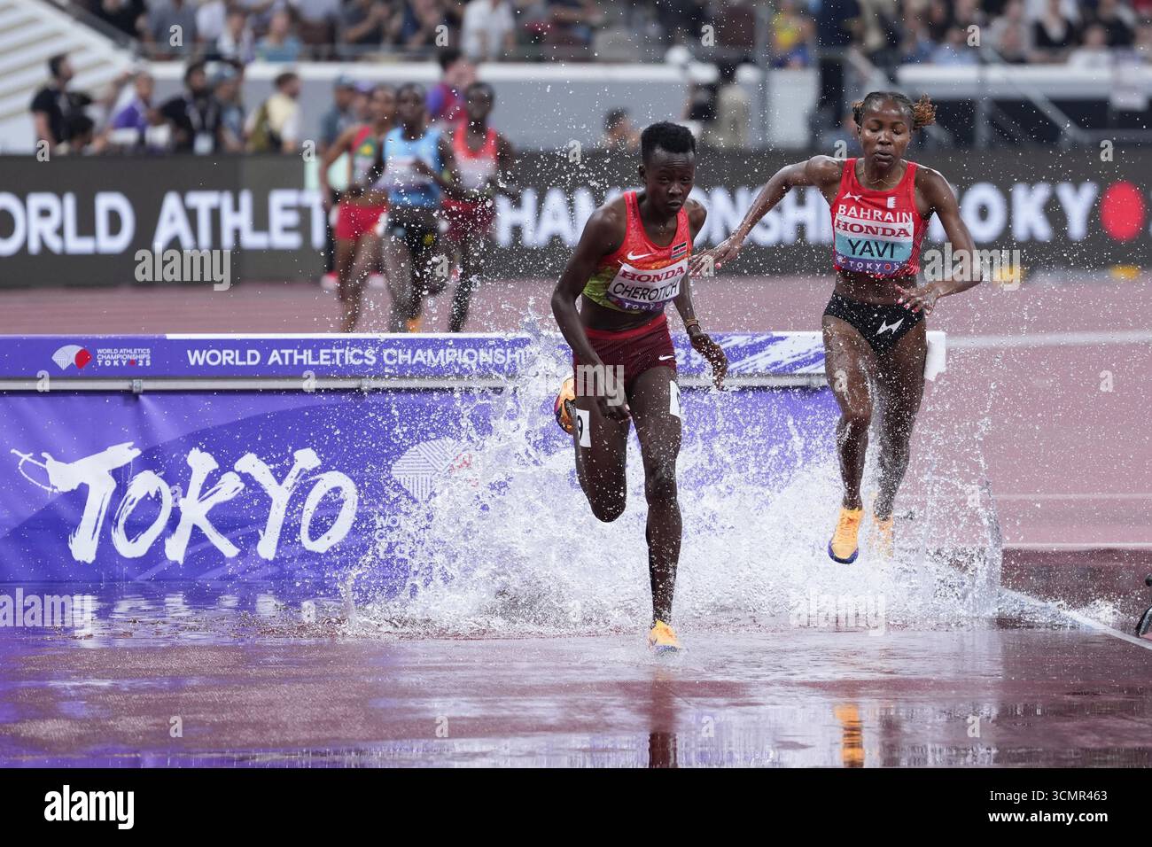 Faith Cherotich (L) of Kenya, followed by Winfred Yavi (R) of Bahrain ...