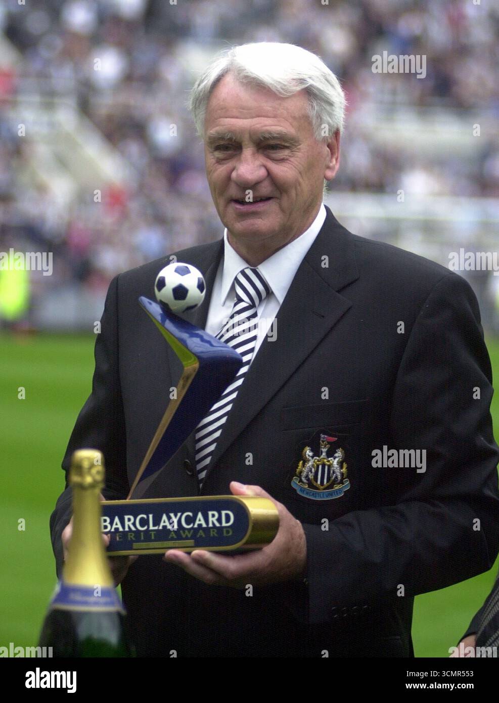 Bobby Robson receives a special Barclaycard trophy to celebrate his ...