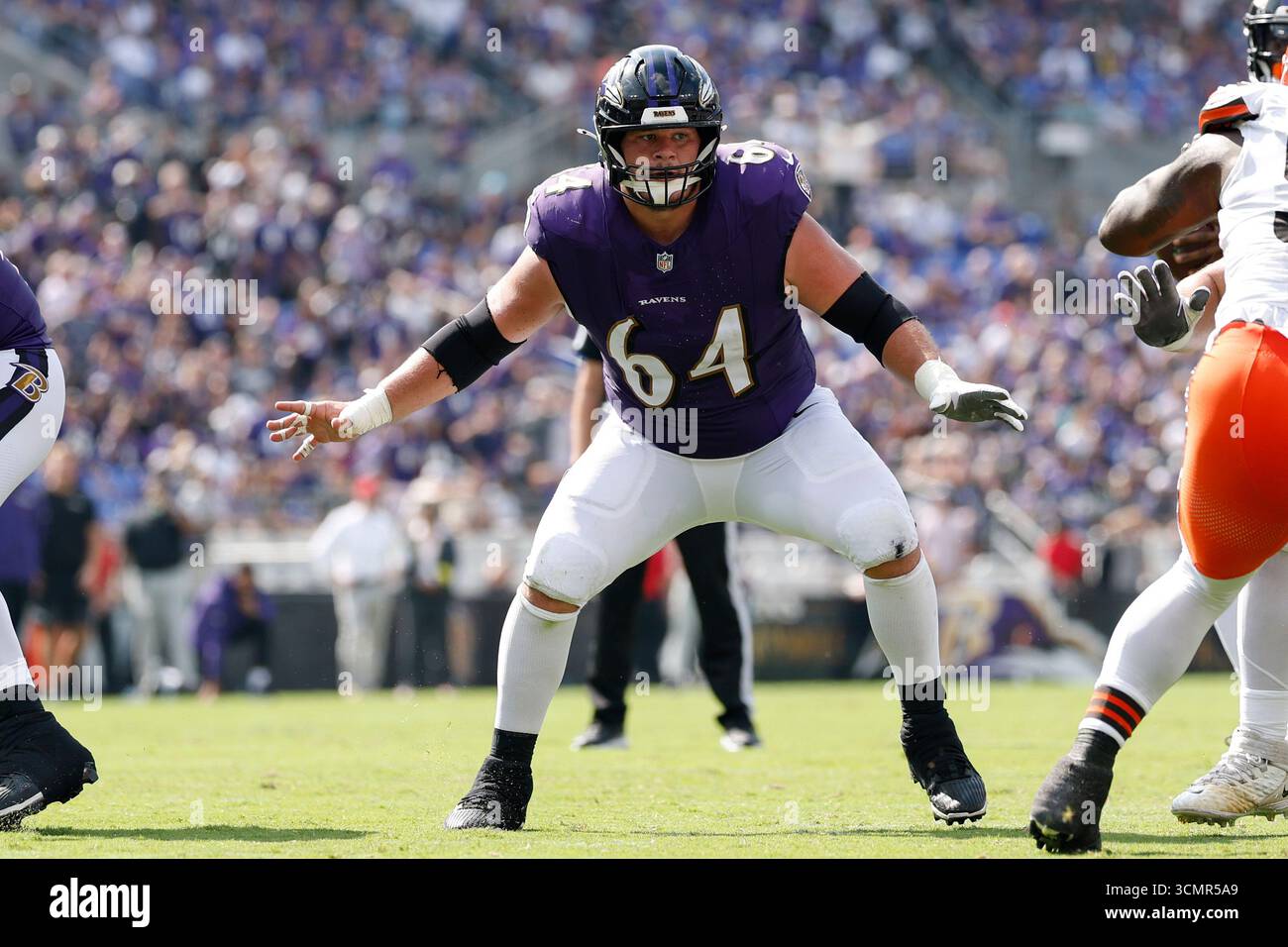 Baltimore Ravens center Tyler Linderbaum (64) in action an NFL football ...