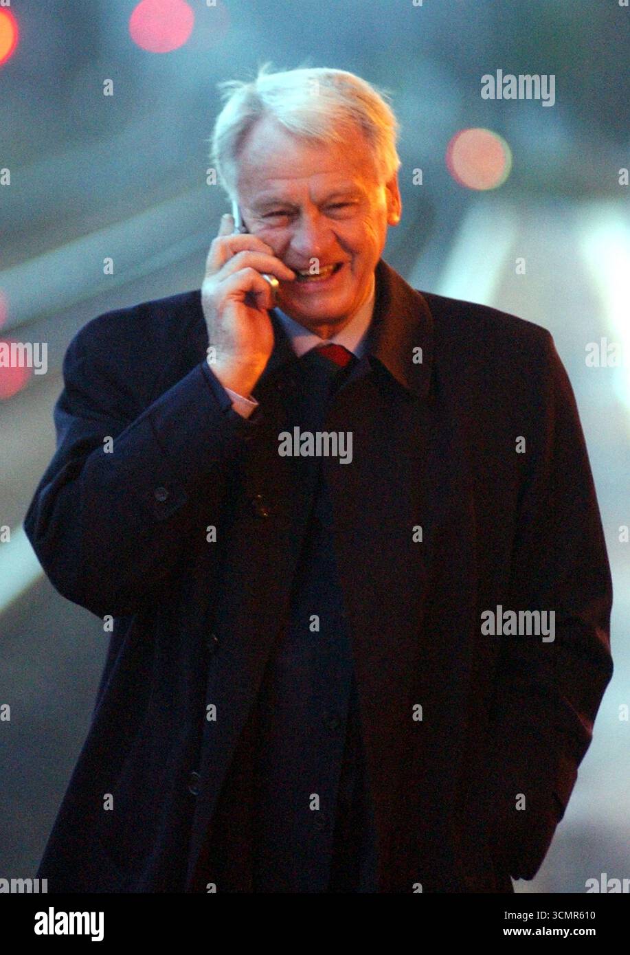 Sir Bobby Robson on the phone during a photo call to back GNER`s bid ...