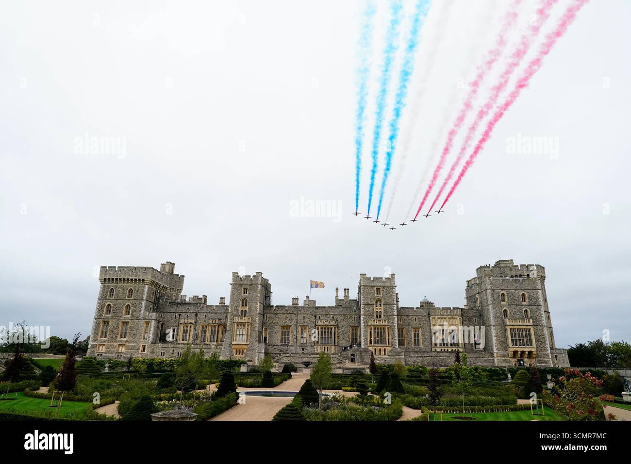A flypast by the RAF Red Arrows takes place during a Beating Retreat ...
