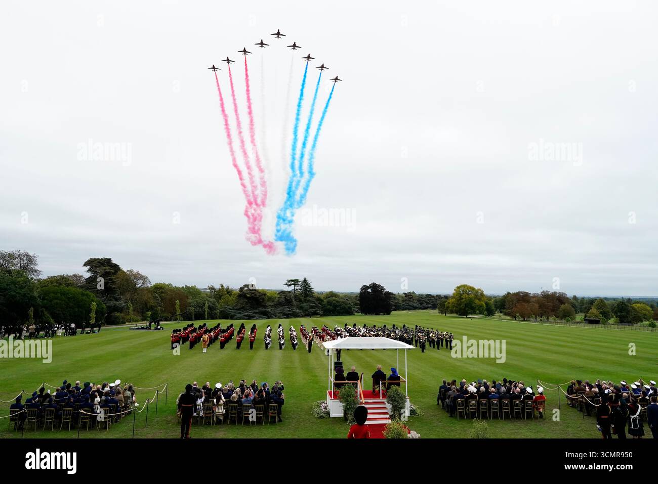 A flypast by the RAF Red Arrows takes place during a Beating Retreat ...