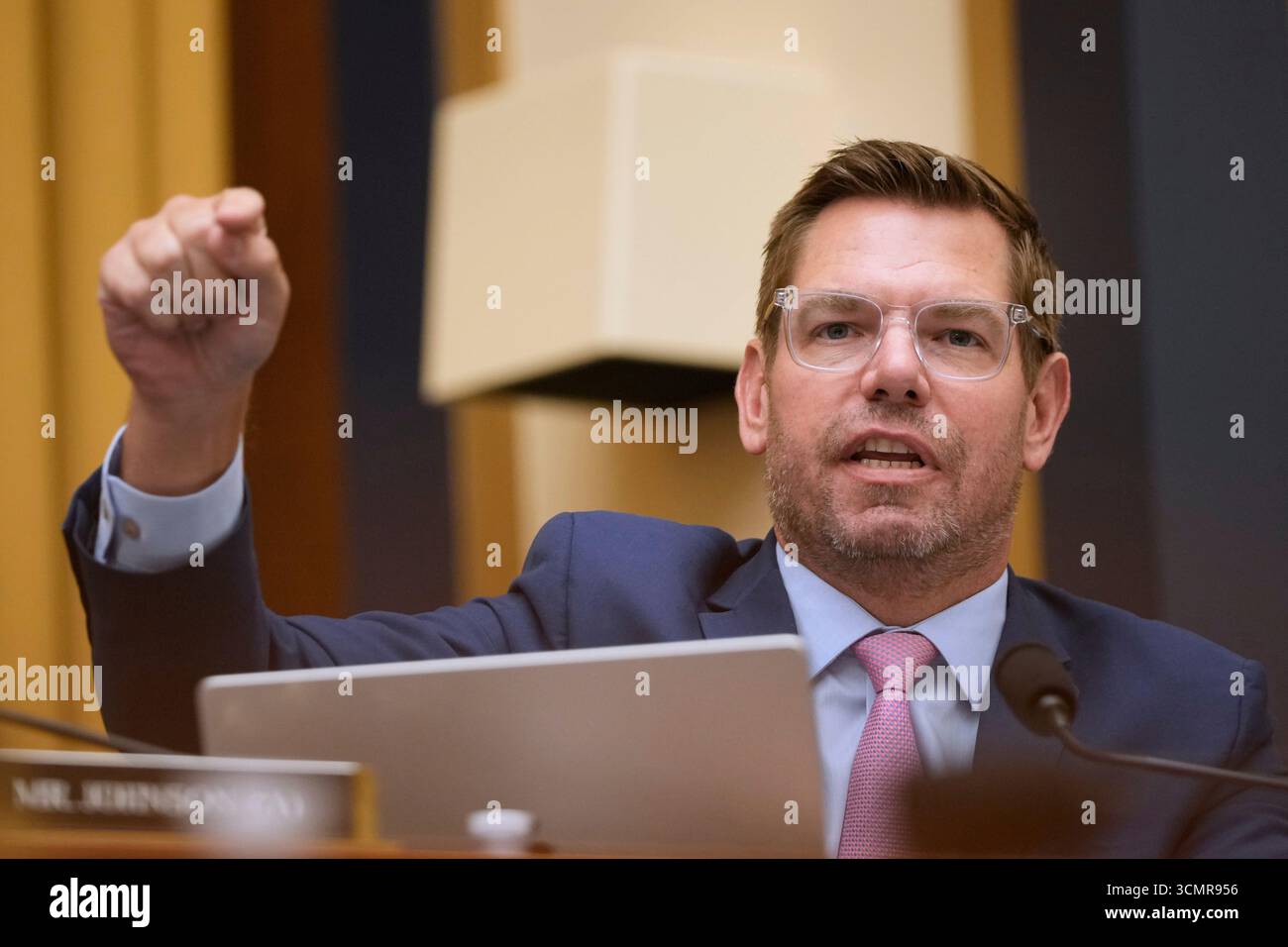 Rep. Eric Swalwell, D-Calif., speaks to FBI Director Kash Patel as he ...