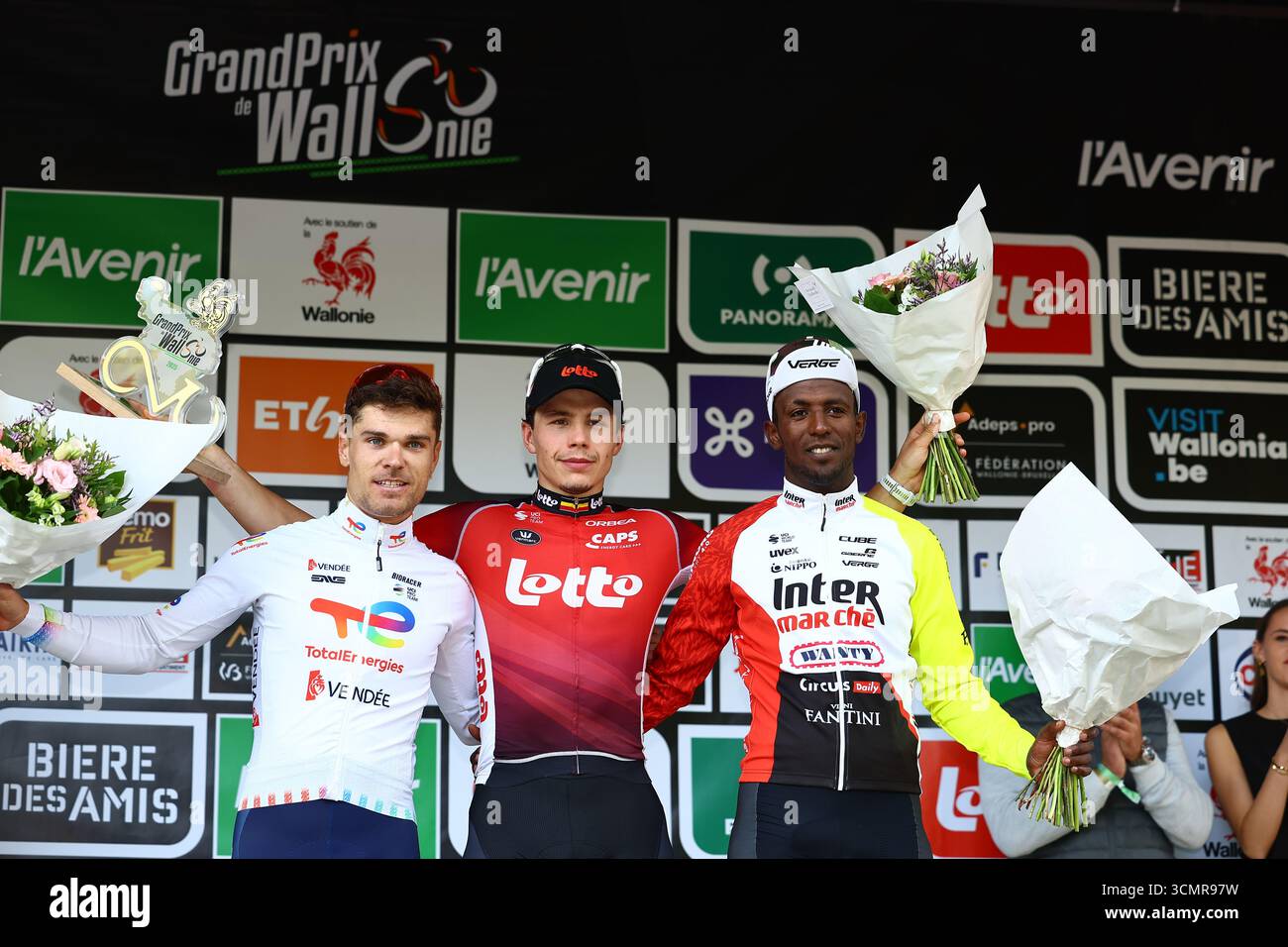 French Emilien Jeanniere of TotalEnergies, Belgian Arnaud De Lie of Lotto Cycling Team and ...