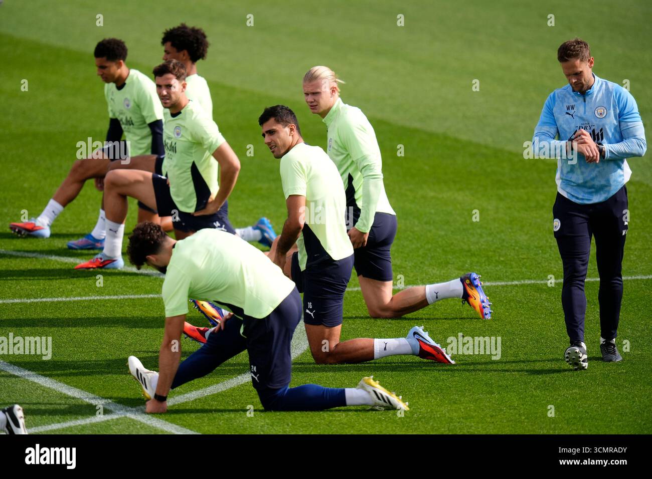 Manchester City's Rodri and Erling Haaland (both centre, facing) with ...