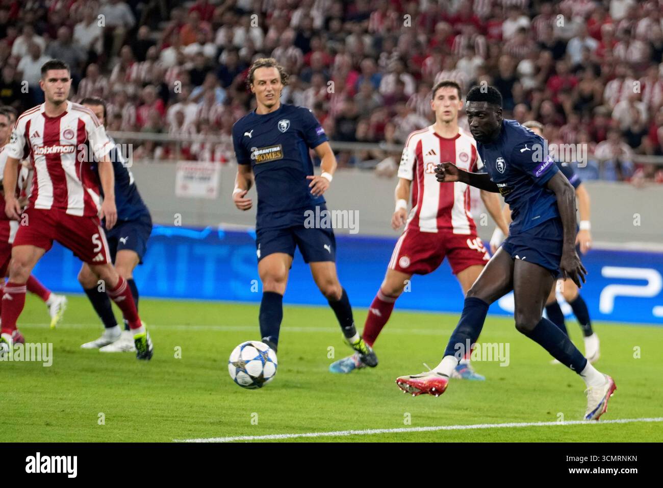 Pafos' Derrick Luckassen fights for the ball during a Champions League ...