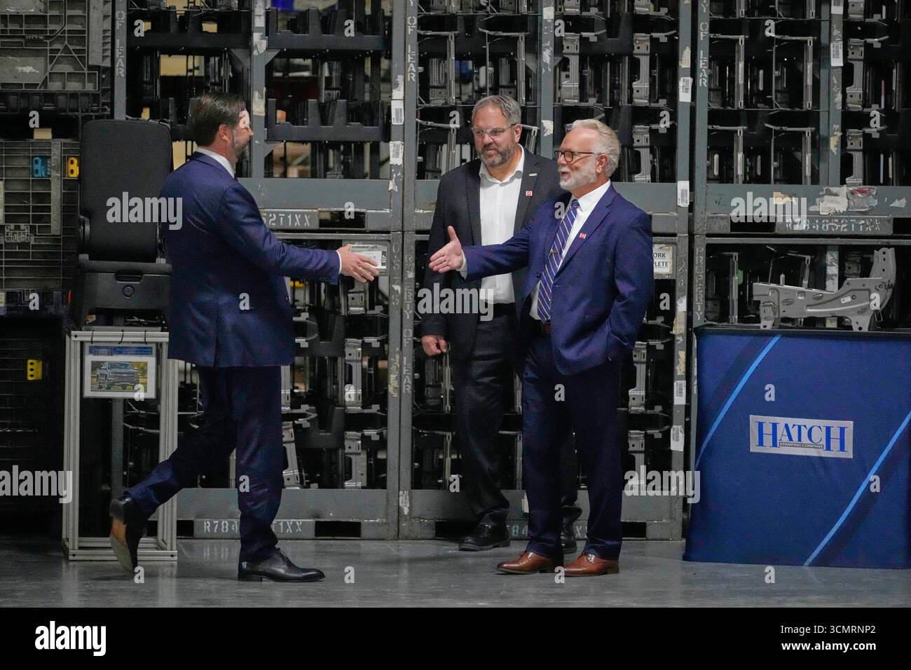 Vice President JD Vance greets Dan Craig, right, President and COO of ...